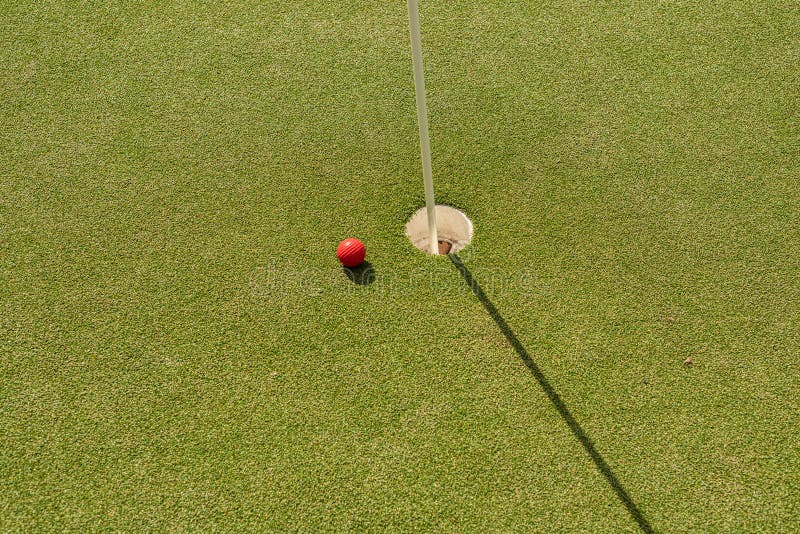 Pin, Hole and Ball of a Minigolf Course.. Stock Image - Image of ball ...
