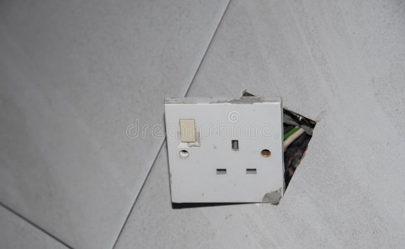 3-pin Plug Socket Adapter Hanging Out from the Wall Stock Image - Image ...