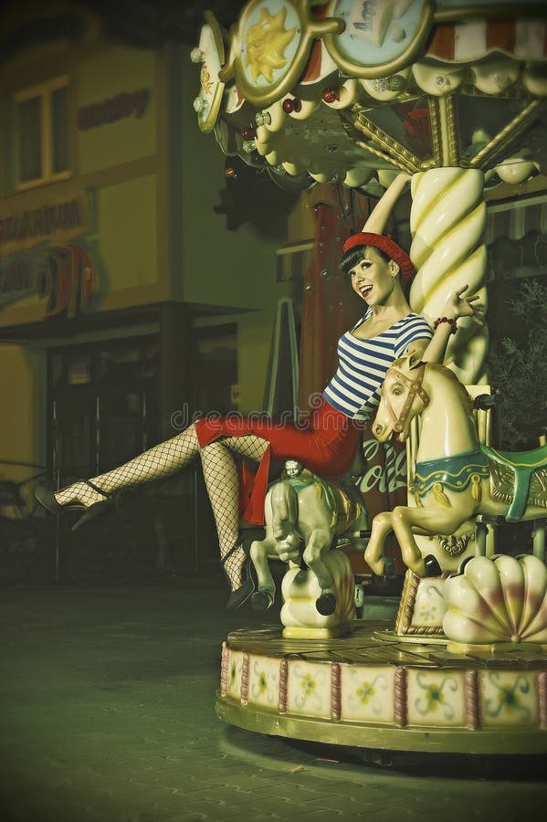 Pin Up Girl and carousel stock photo. Image of beautiful - 16896700