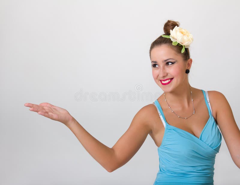 Pin-up Girl Showing Something on Palm of Hand Stock Image - Image of ...