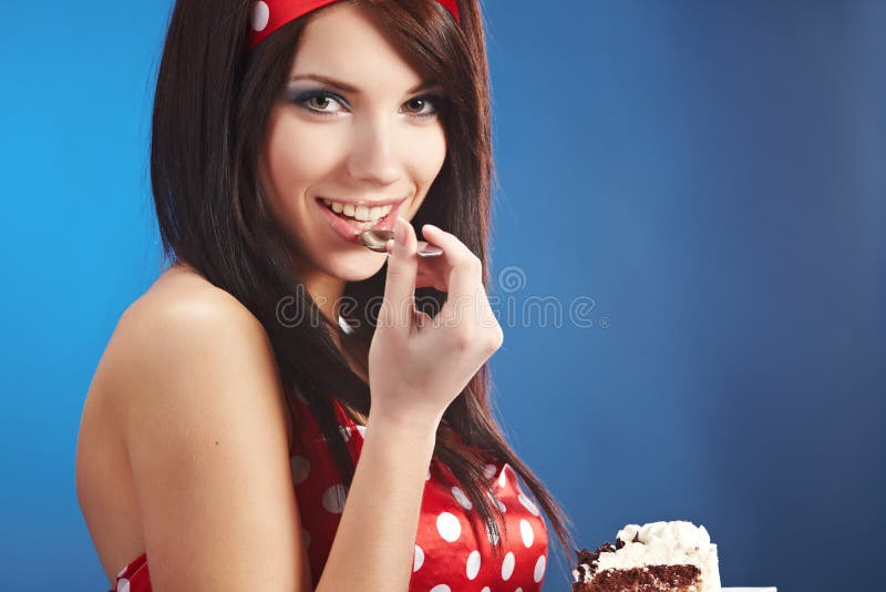 Pin-up woman with the cake stock photo. Image of laying - 11985096