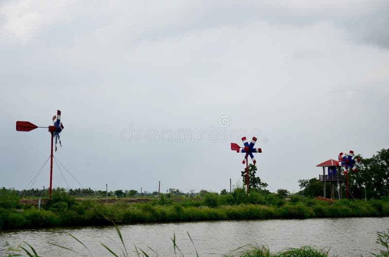 Pin Wheel or Windmill and Wind Rain Storm Stock Photo - Image of rural ...