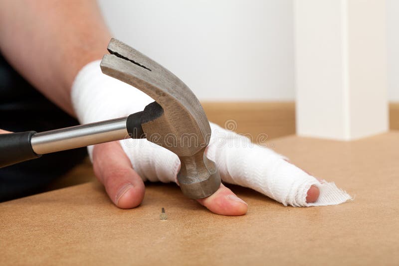 Pinched with hammer stock photo. Image of hand, house - 38171430