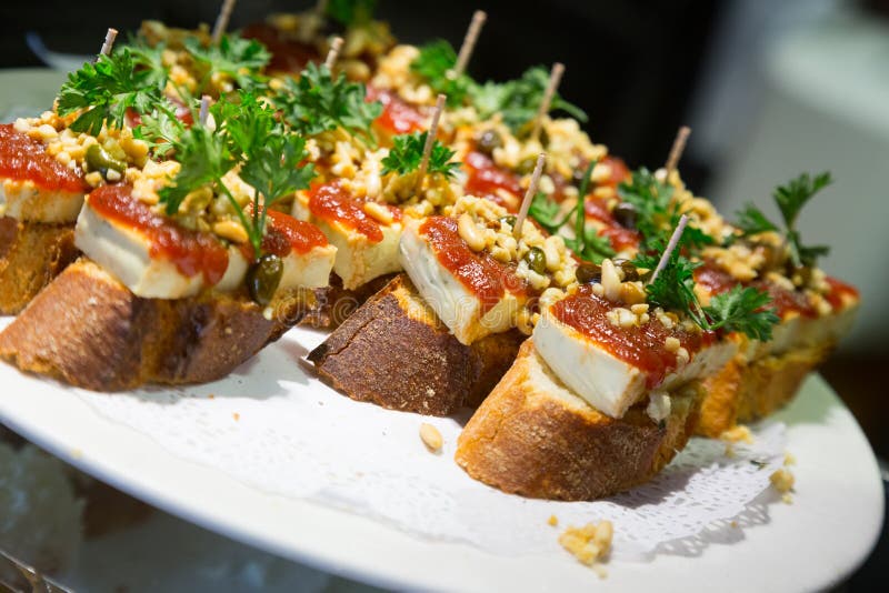 Pinchos And Tapas Typical Of The Basque Country, Spain. Selection Of ...