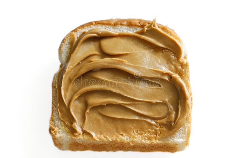 Pindakaas op wit brood stock afbeelding. Afbeelding bestaande uit pinda ...