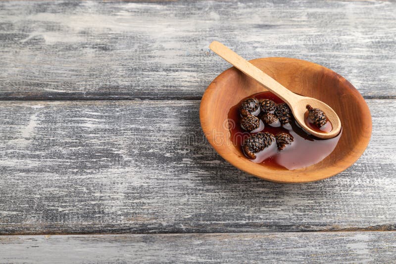 Pine Cone Jam in Wooden Bowl, Side View, Copy Space Stock Photo - Image ...