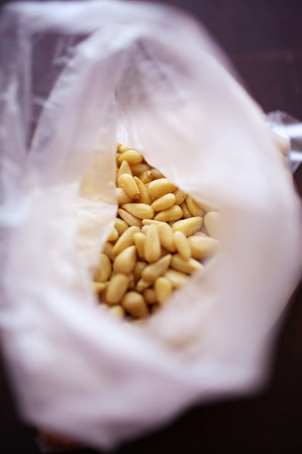 Pine nuts in plastic bag stock image. Image of decorated - 7678463