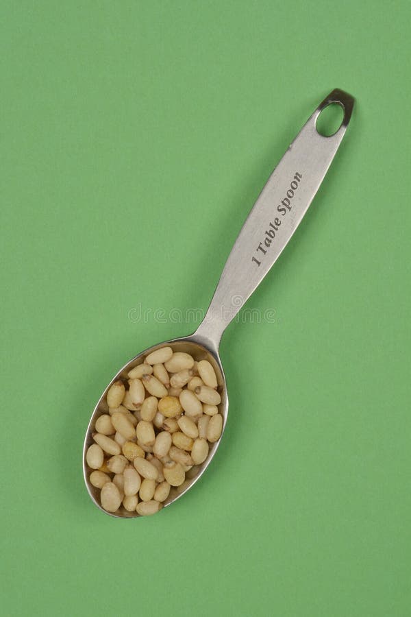 Pine nuts stock image. Image of green, metal, flat, measuring - 372549153
