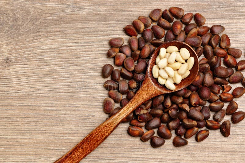 Pine nuts in a spoon stock image. Image of tree, healthy - 65012997