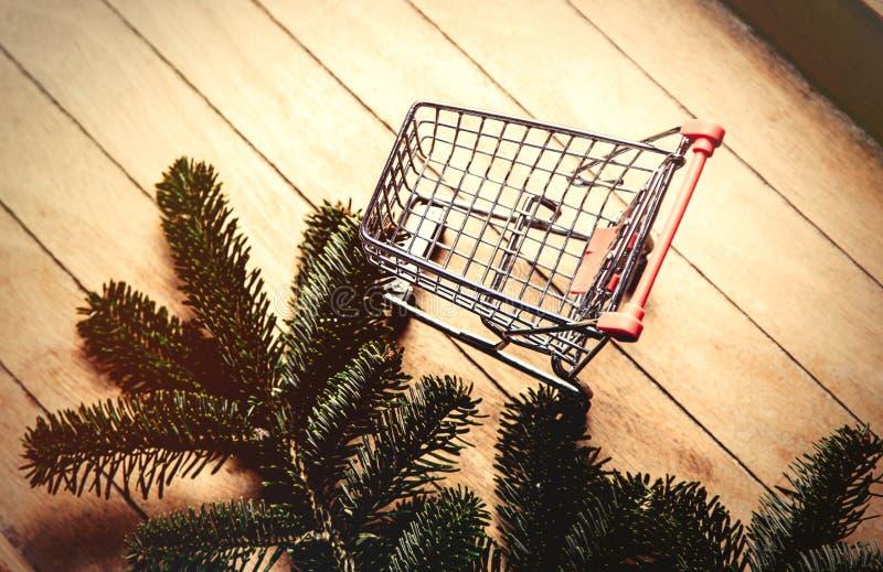 Pine Tree Branch and Shopping Cart Stock Image - Image of holiday ...