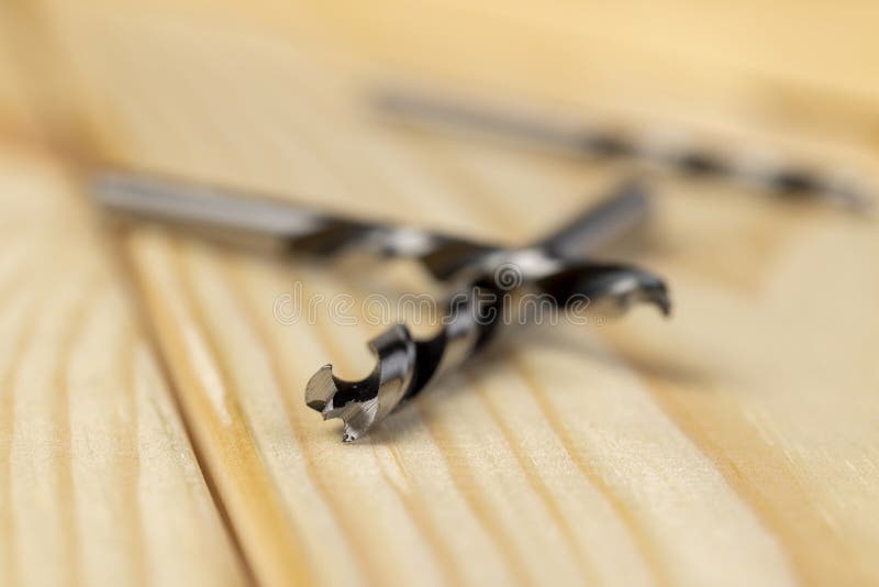 Pine Wood and Metal Drill Bit for Construction Work Stock Image - Image ...