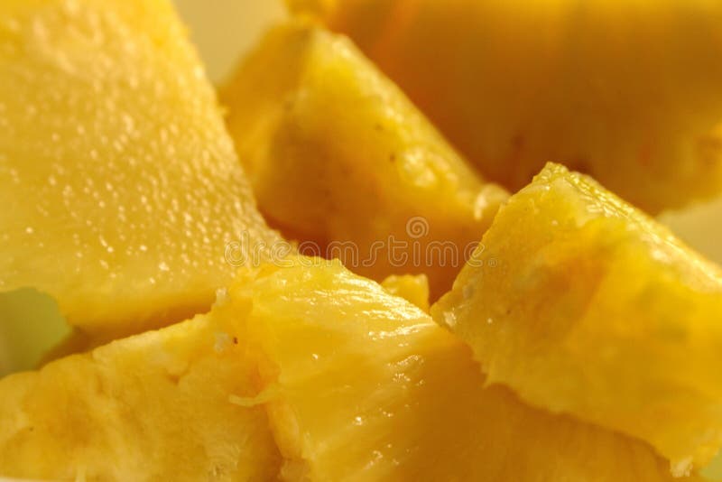 Pineapple Chunks in the Closeup Stock Photo - Image of abstract, bowl ...
