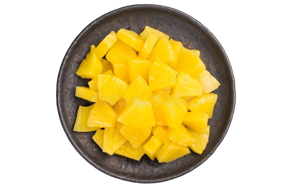 Pineapple Chunks Slices in a Plate Isolated on White Background. Top ...
