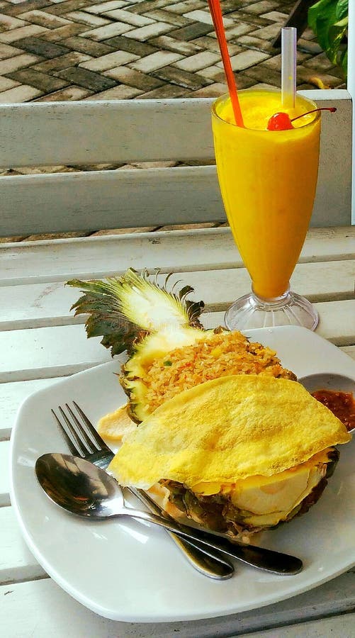 Pineapple Fried and Mango Juice Stock Image - Image of fork, meat ...