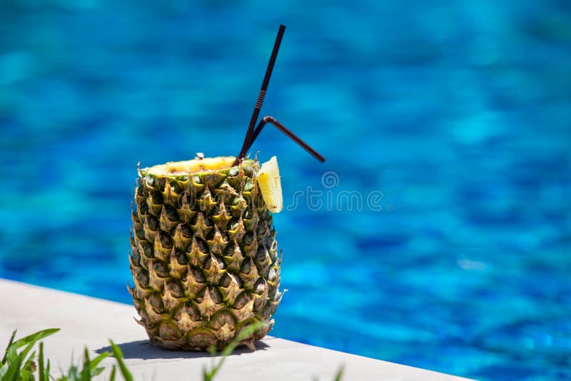 Pineapple Juice Near Swimming Pool Stock Photo - Image of green ...