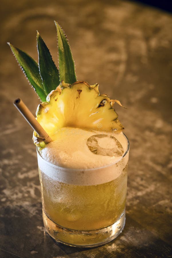 Pineapple Mango Tropical Rum Cocktail Drink in Bar Stock Photo - Image ...