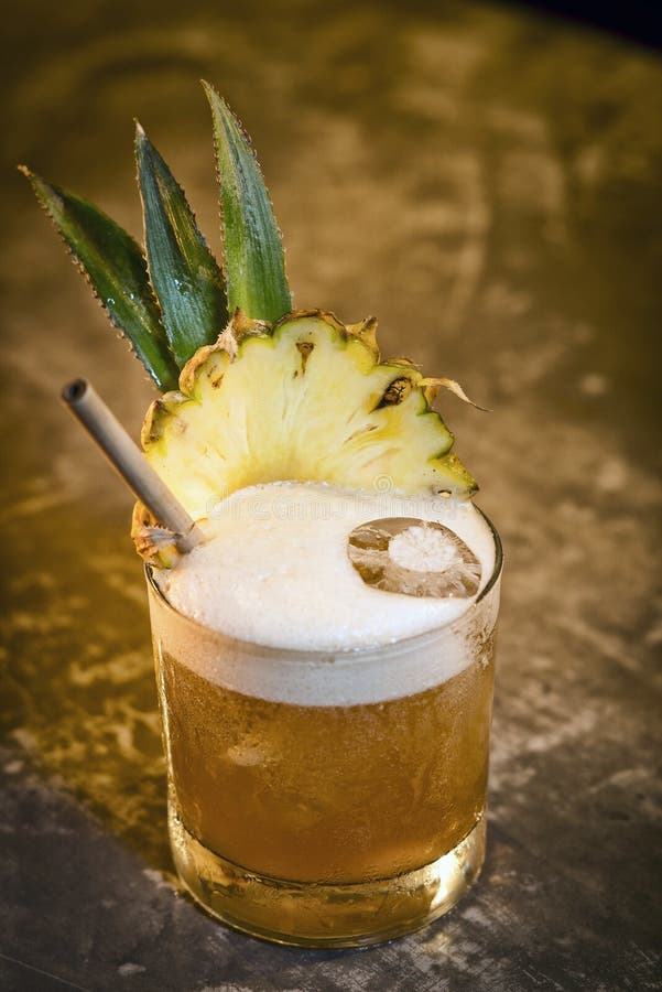 Pineapple Mango Tropical Rum Cocktail Drink in Bar Stock Photo - Image ...