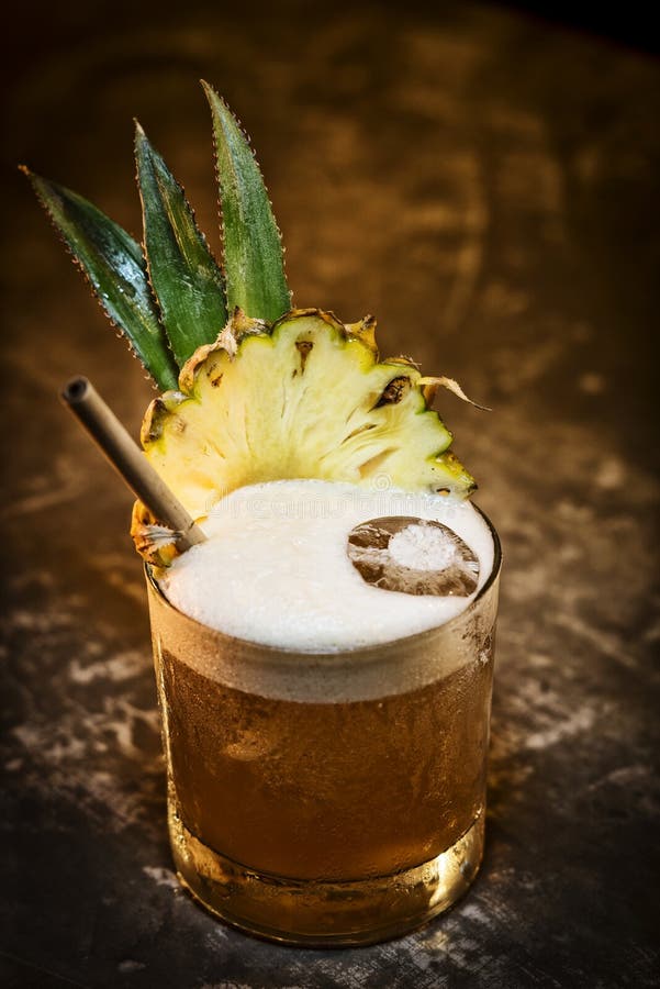 Pineapple Mango Tropical Rum Cocktail Drink in Bar Stock Image - Image ...