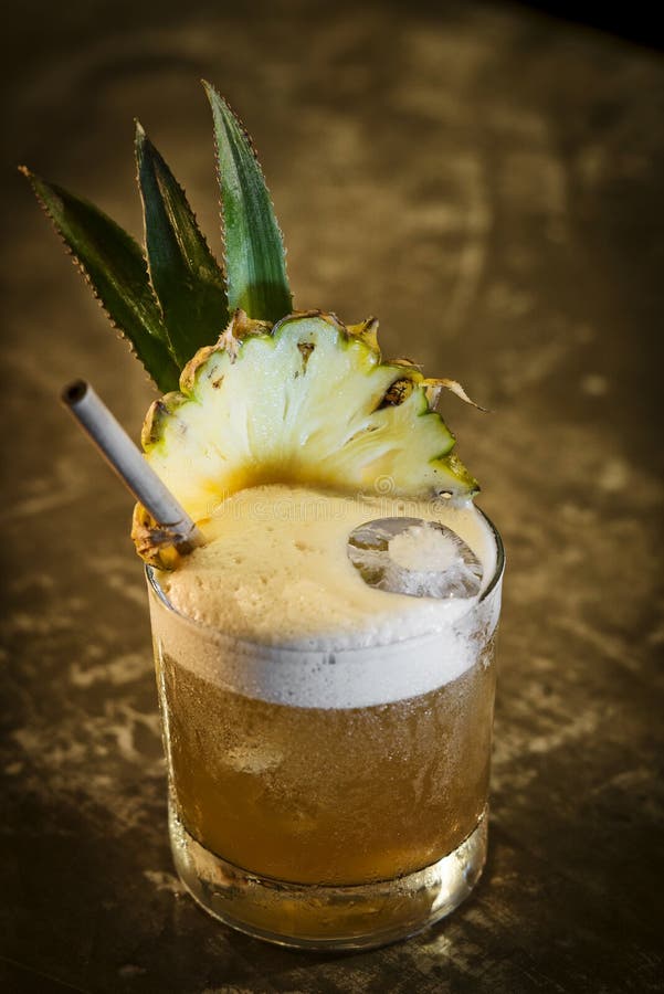 Pineapple Mango Tropical Rum Cocktail Drink in Bar Stock Photo - Image ...
