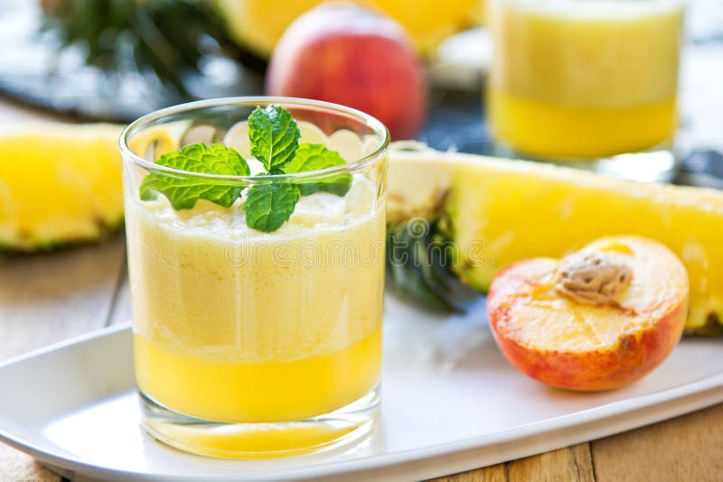 Pineapple with Peach Smoothie Stock Photo - Image of green, sour: 30993524