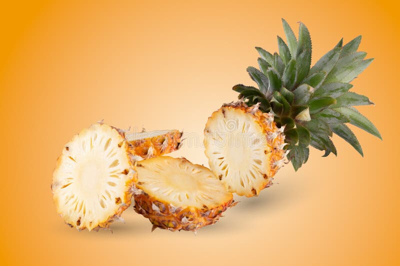 Pineapple Slices Isolated on an Orange Background Stock Photo - Image ...