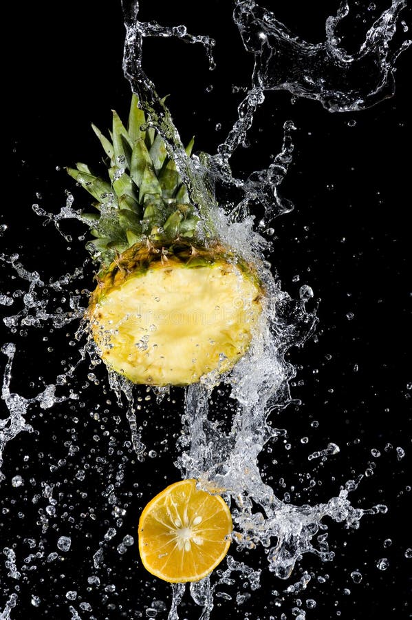 Pineapple with Splashing Water Stock Photo - Image of drenched, diet ...