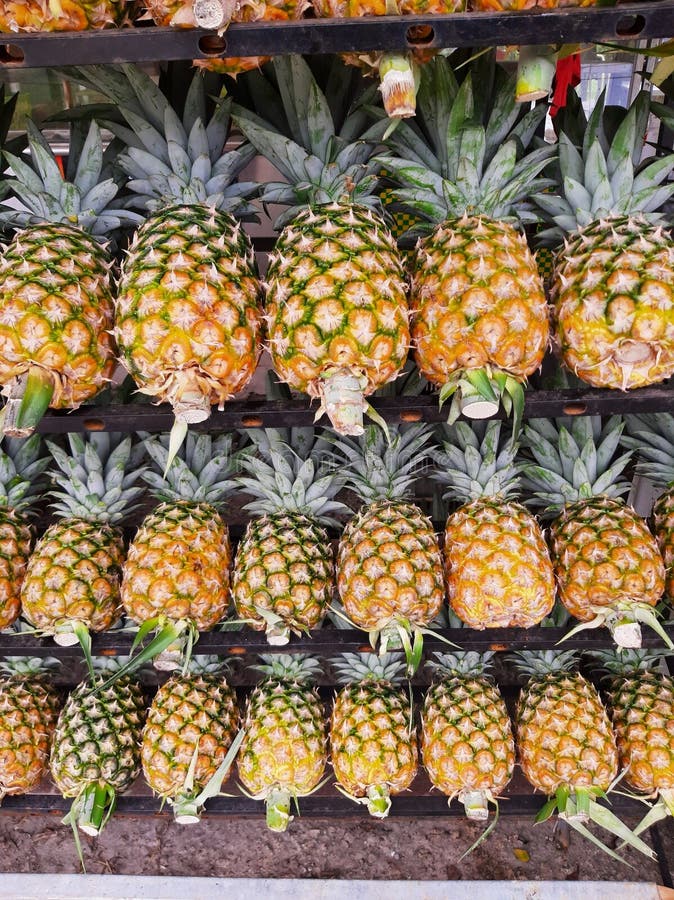 Pineapple Stacking on the Shelves Stock Photo - Image of produce, fruit ...