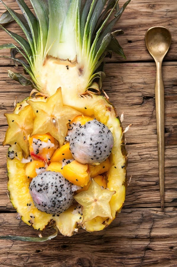 Pineapple Stuffed with Exotic Fruits Stock Photo - Image of fruity ...