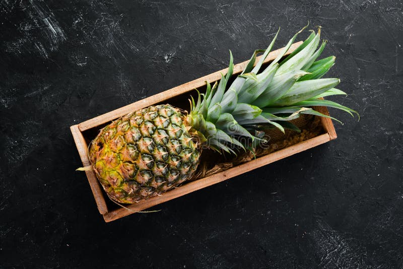 Pineapple in a Wooden Box. Tropical Fruits Stock Photo - Image of ...