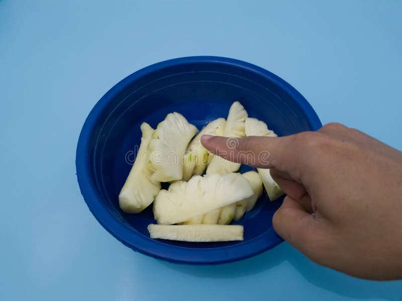 Pineapples that Have Been Peeled and Cut into Pieces are Placed in a ...