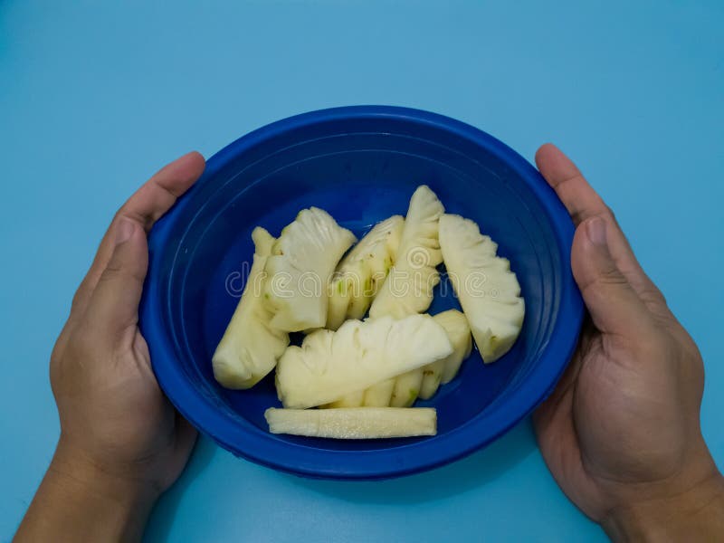Pineapples that Have Been Peeled and Cut into Pieces are Placed in a ...