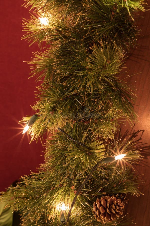 Pinecone and Evergreen Garland with Lights Stock Photo - Image of ...