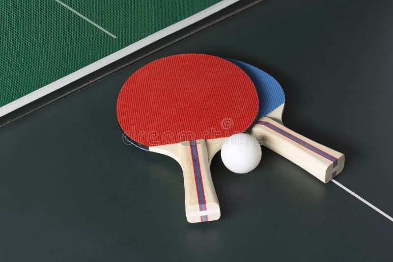 Ping Pong Paddles on Table, Both on Same Side Stock Image - Image of ...