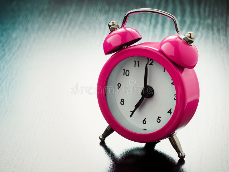 A Pink Alarm Clock on a White Background Stock Image - Image of ...
