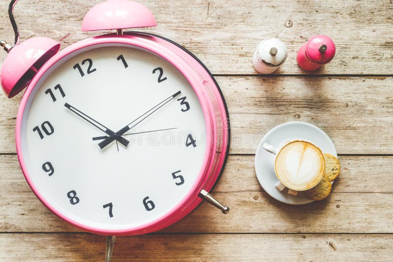 Pink Alarm Clock on Wooden Table Top View Stock Photo - Image of table ...