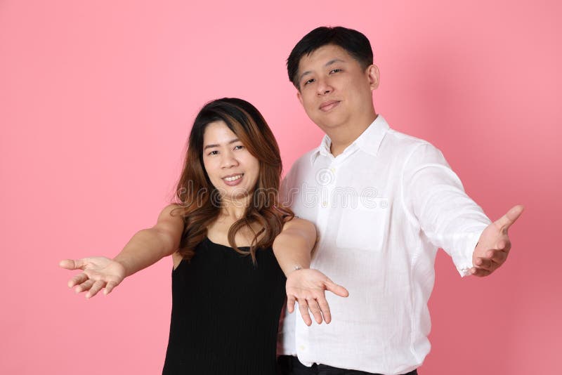 Pink Asian Couple stock photo. Image of colorful, happiness - 235312440