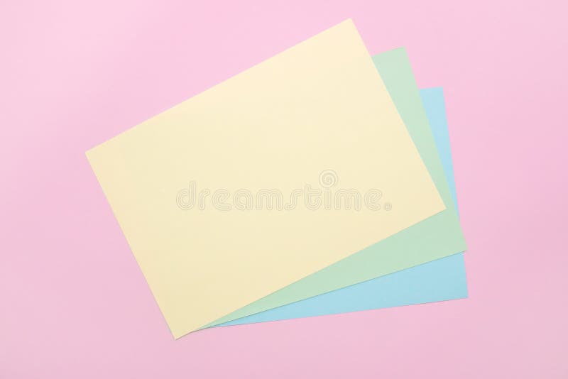 On a Pink Background, Empty Multi-colored Sheets To Fill Stock Photo ...