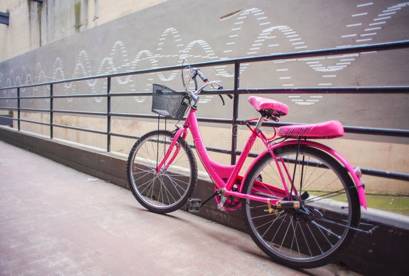 Pink bike stock photo. Image of iron, railing, bicycle - 54056596