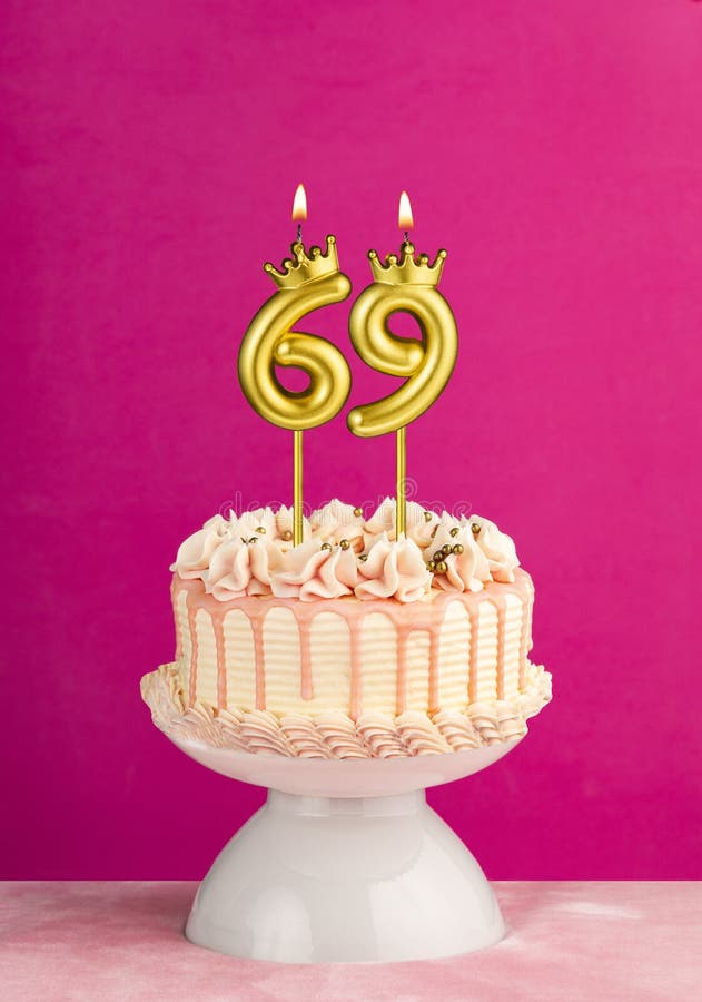 Pink Birthday Celebration Cake with Number 69 Candle Stock Image ...