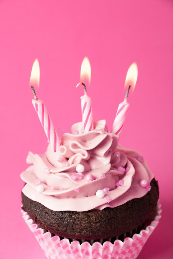 Pink birthday cupcake stock photo. Image of sweet, candle - 49122398