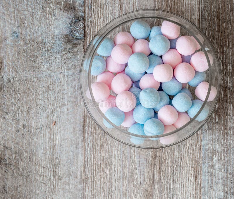 Pink and Blue Candies on a Wooden Background Stock Photo - Image of ...