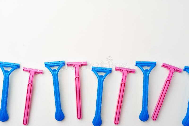 Pink and Blue Razors on White Background Stock Image - Image of ...