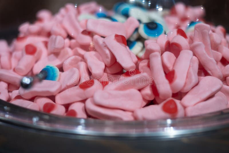 Pink and Blue Sugary Gummies and Candies in Various Shapes and Colors ... Pink and Blue Sugary Gummies and Candies in Various Shapes and Colors ...