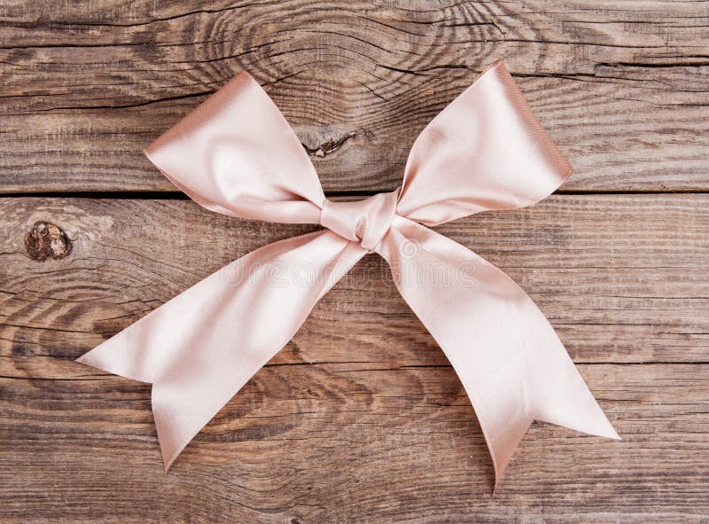 Pink Bow Lying on the Old Board Stock Photo - Image of board, greeting ...