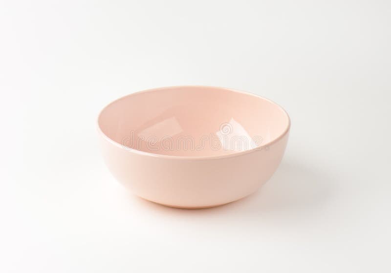 A Pink Bowl of Pasta with Chicken and Spinach on a Table Stock Image ...