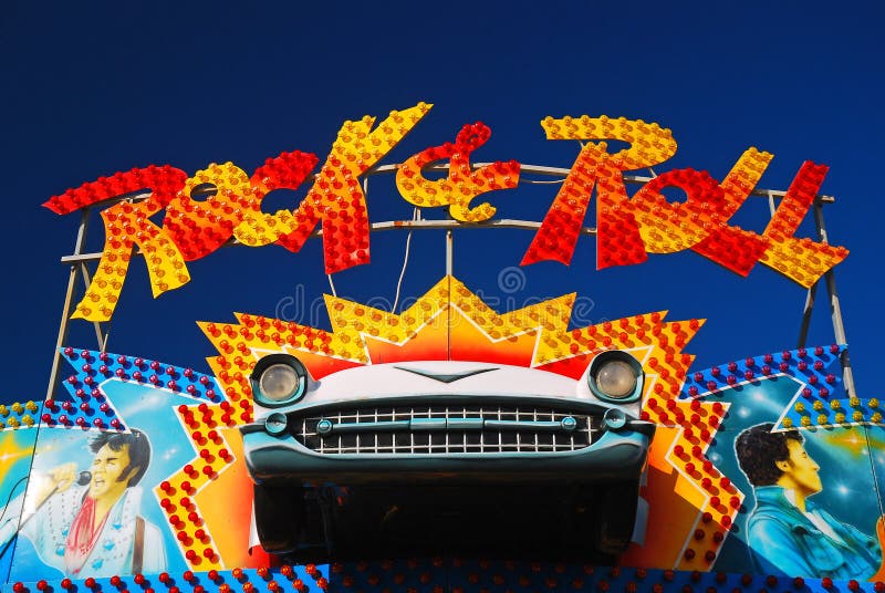 A Pink Caddy Emerges from Under a Rock and Roll Sign Editorial Image ...