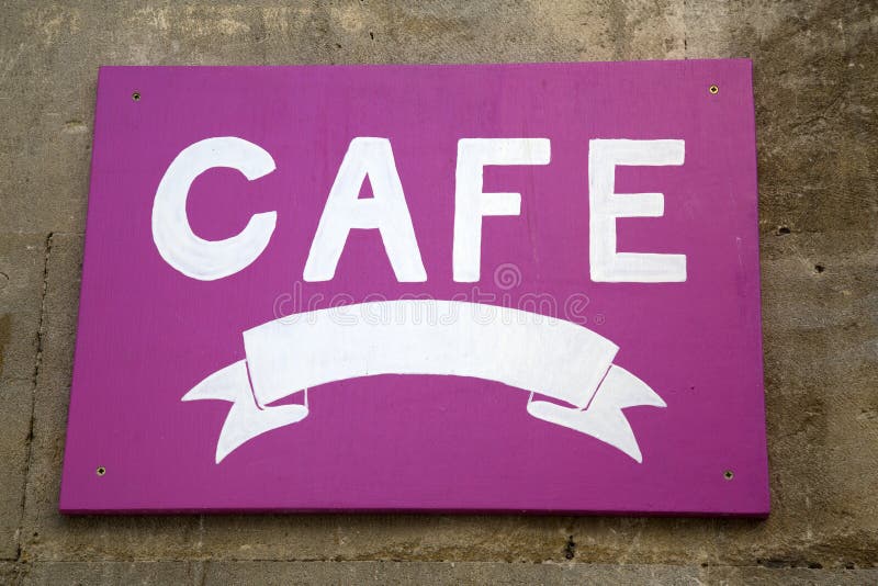 Red on pink cafe sign stock image. Image of seas, wall - 59337995