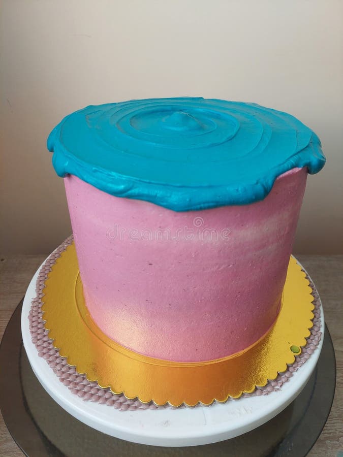 Pink Cake and Blue Icing for Birthday on the Table Stock Photo - Image ...