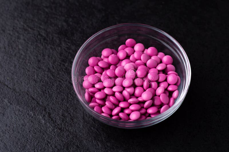 Candy Coated Chocolate Button Sprinkles in a Bowl on Dark Slate - M&Ms ...