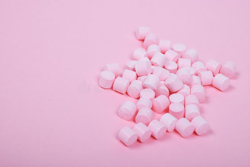 Pink Candy Lollies on a Pink Background Stock Image - Image of ...